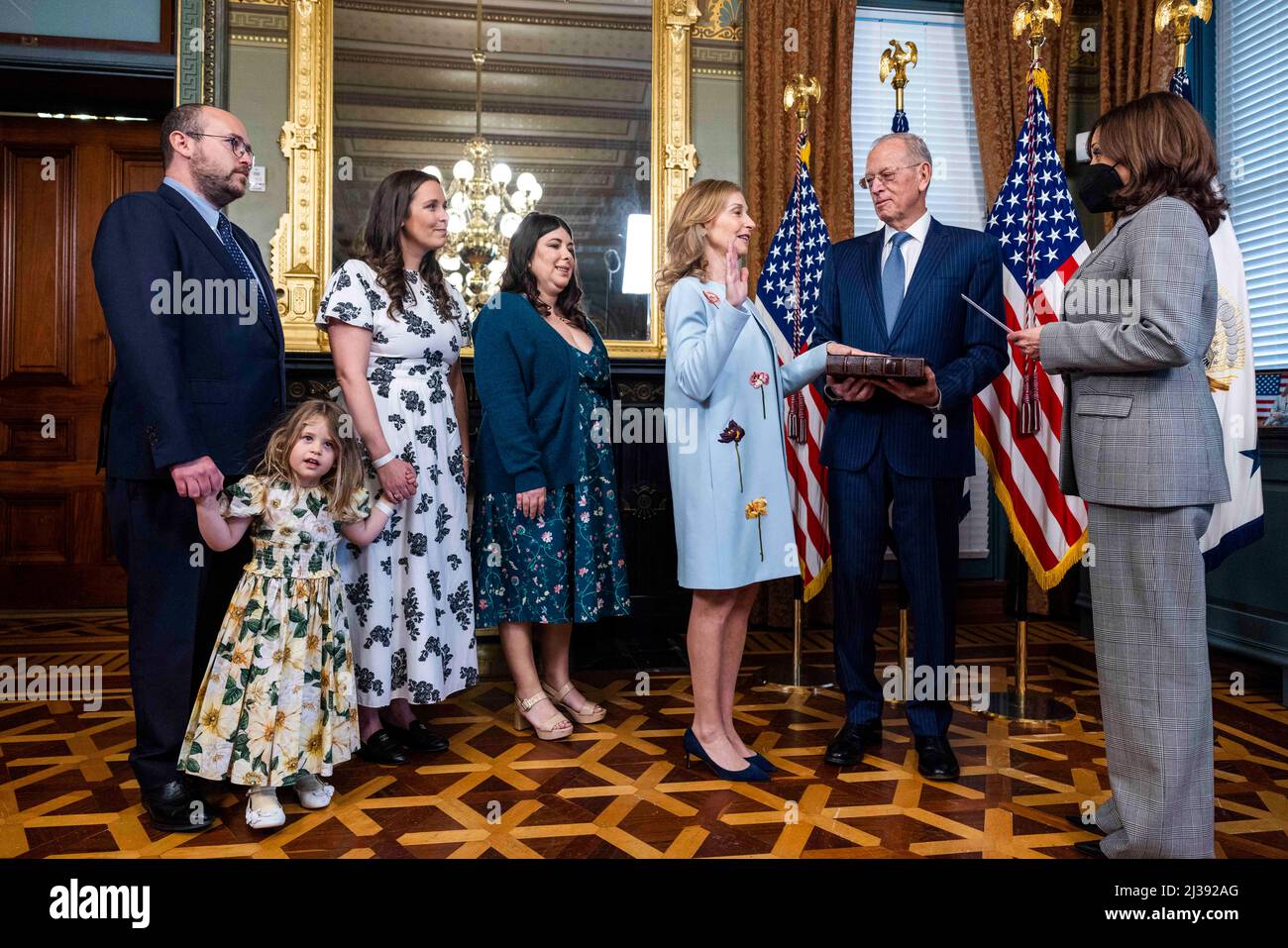 US Vice President Kamala Harris (R) swears in Randi Levine (C-R) as the ...