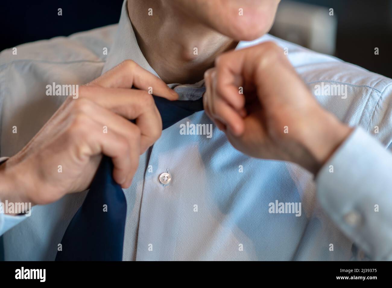 Untie his tie hi-res stock photography and images - Alamy