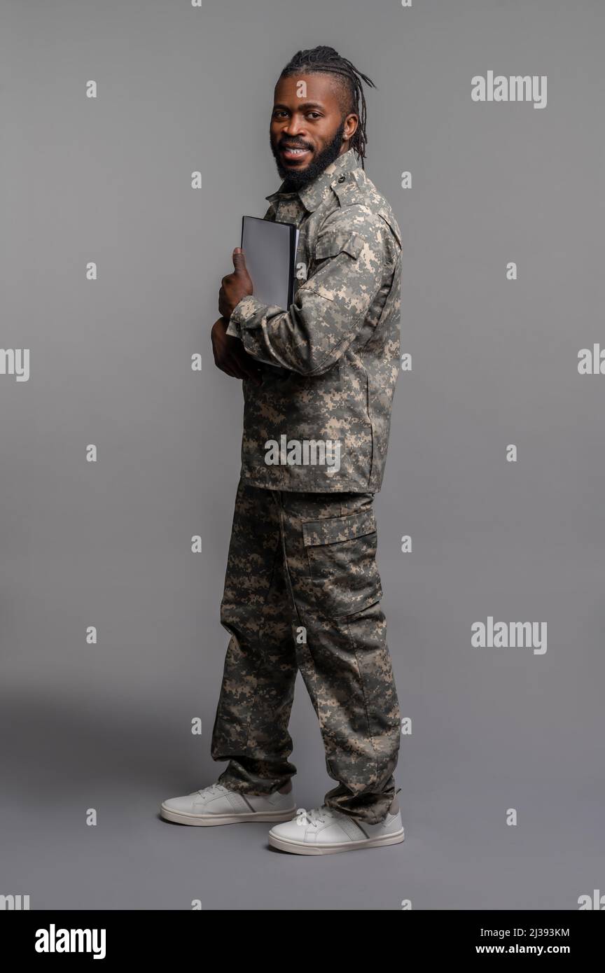 Holding clipboard chest hi-res stock photography and images - Alamy