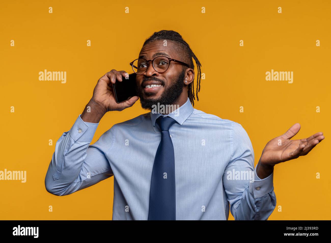 Young black guy speaking hi-res stock photography and images - Alamy