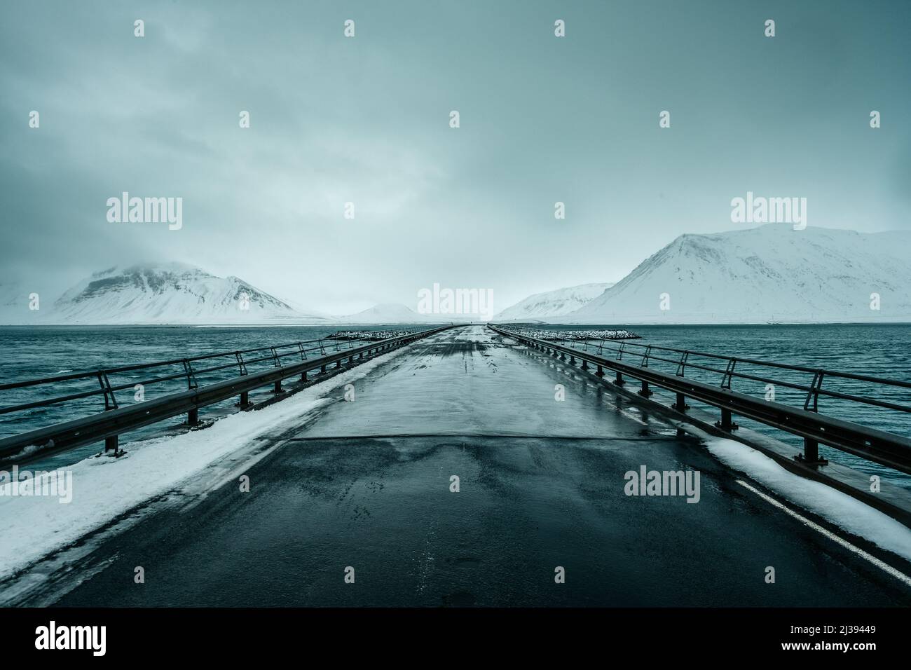 Wet bridge crosses sea hi-res stock photography and images - Alamy