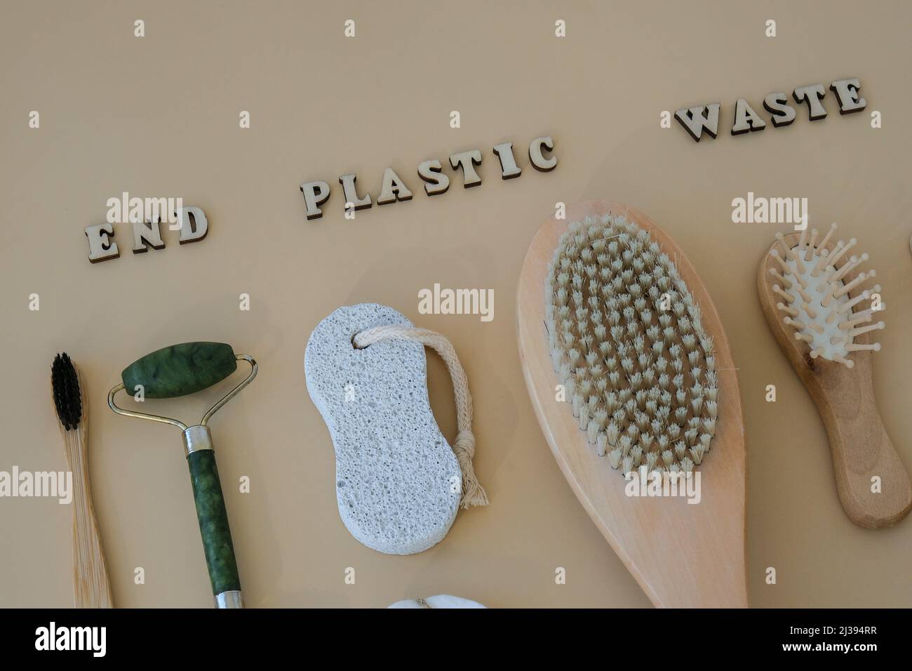 END PLASTIC WASTE text around Natural skin care products on neutral ...