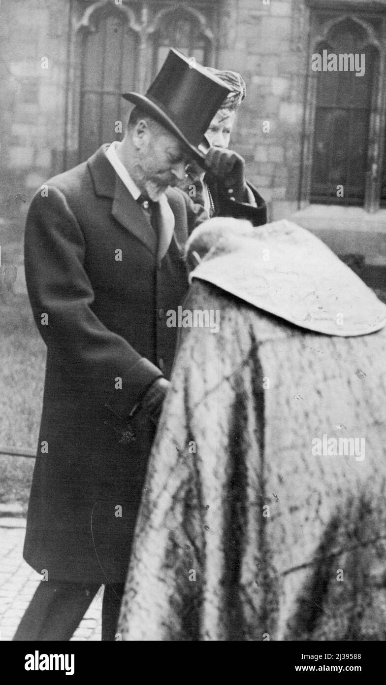 The King's Maundy Money. An Abbey official bids the King goodbye after ...