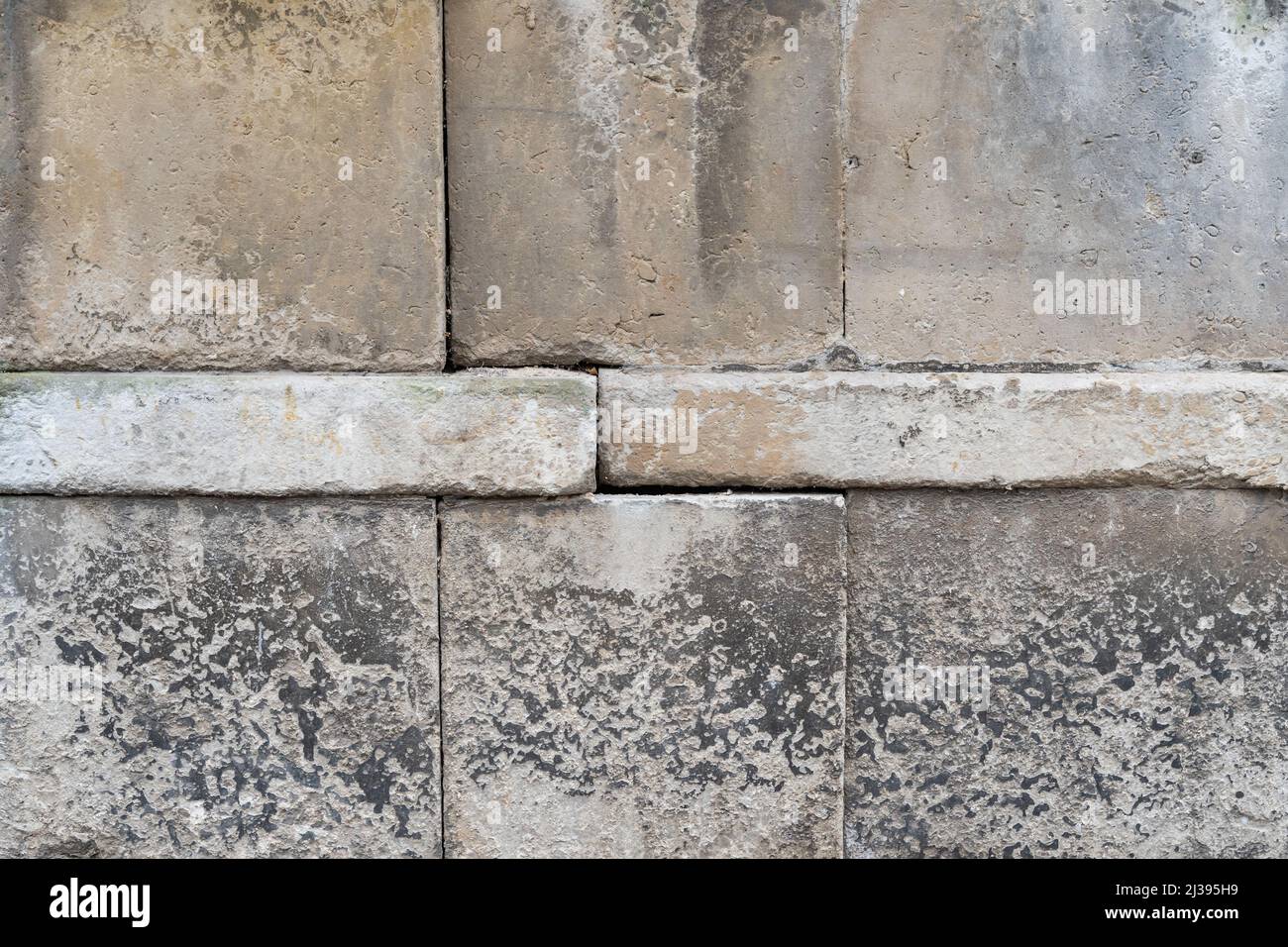 Big old stone blocks as part of a solid wall. Building exterior ...