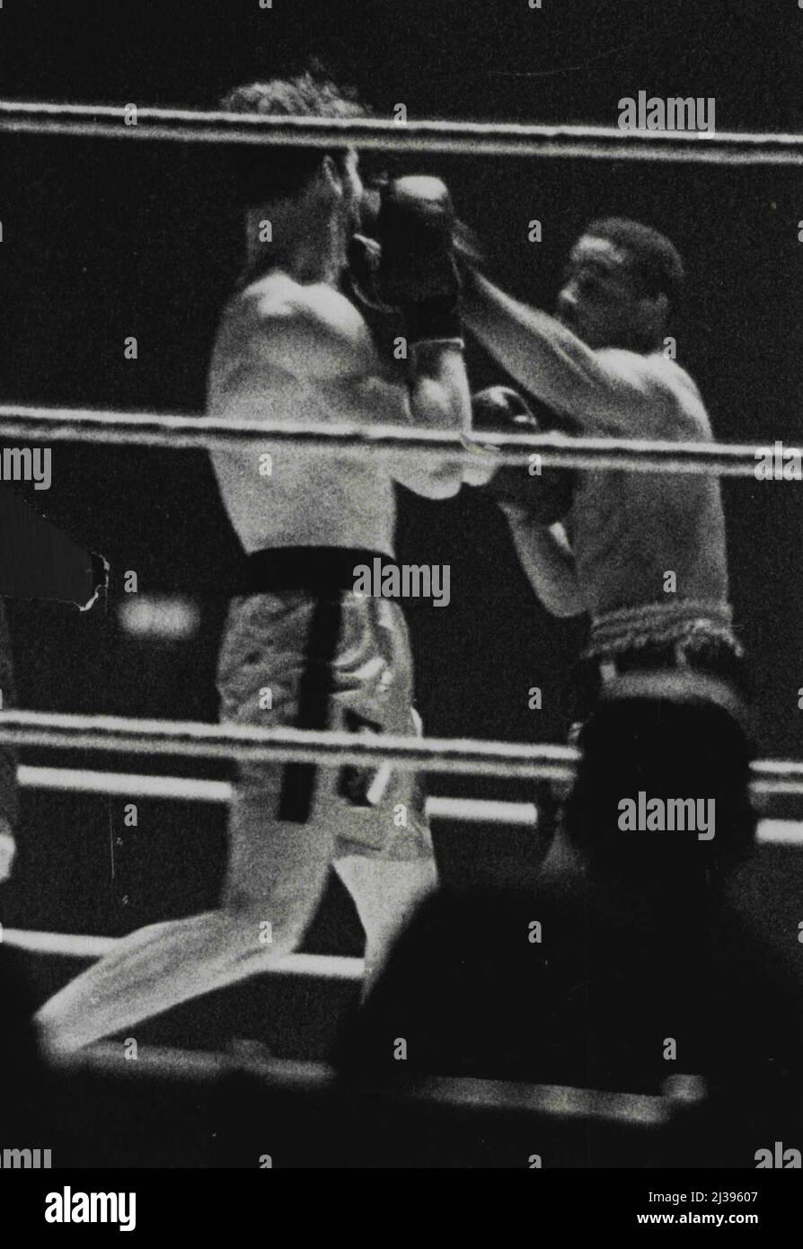 John Henry Lewis Retains His Title -- Lewis connects with a left to ...