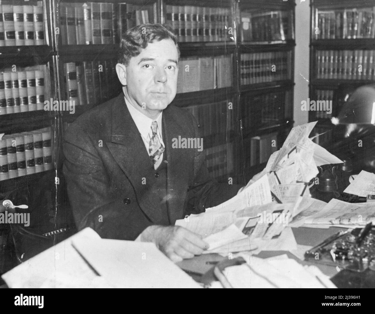 Huey Long Looks A Congratulations -- Senator Huey P. Long looks over a ...