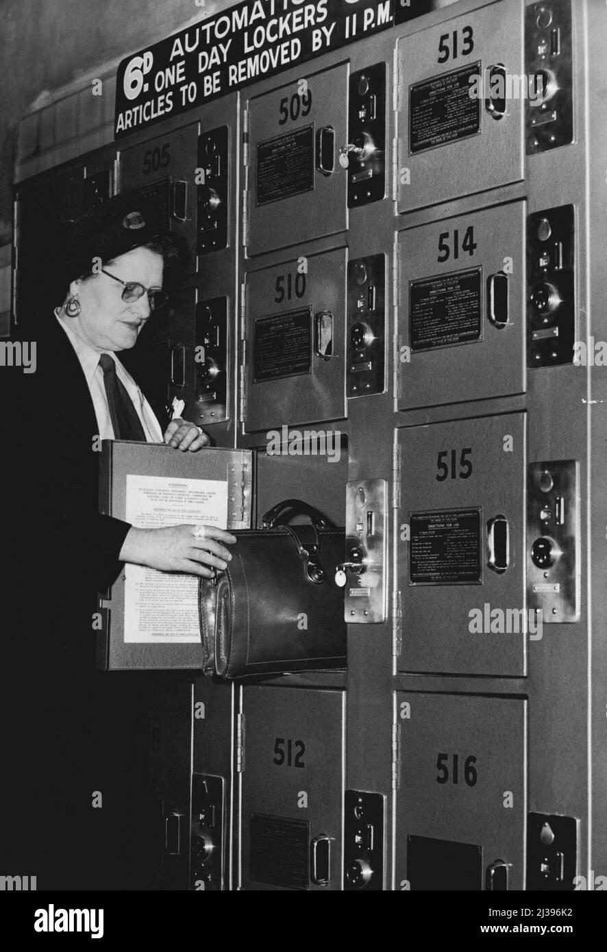 New Railway Lockers -- Mrs. M. Street, Town Hall Railway Asst. checking ...