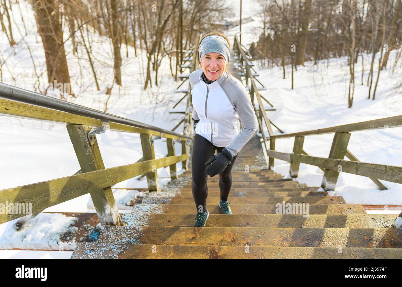 Running on stairs hi-res stock photography and images - Alamy
