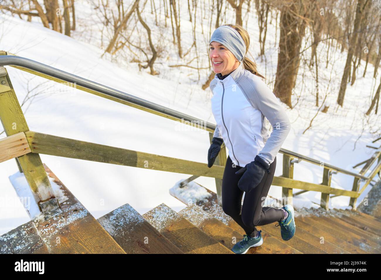 Running on stairs hi-res stock photography and images - Alamy