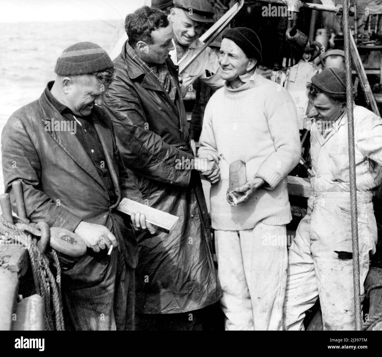 From left: Captain J.H. Herd, salvage, officer, and Captain J.P ...