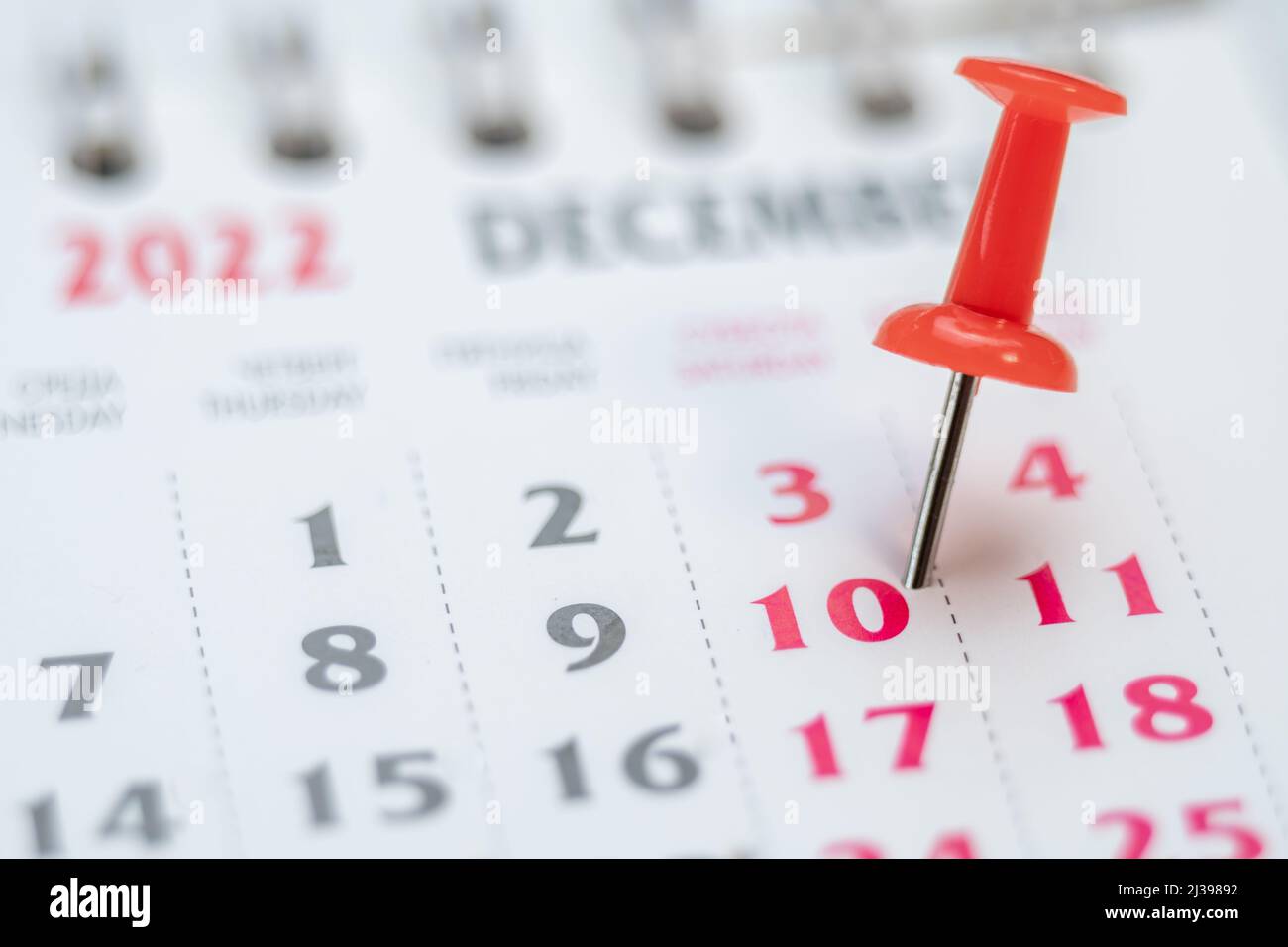 Red push pin on calendar 10th day of the month, mark the Event day with ...
