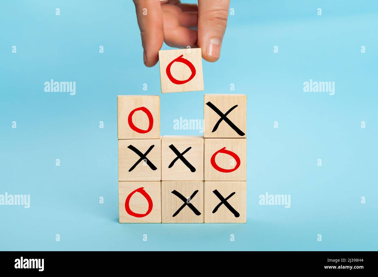 Wooden block tic tac toe board game. Business marketing strategy ...