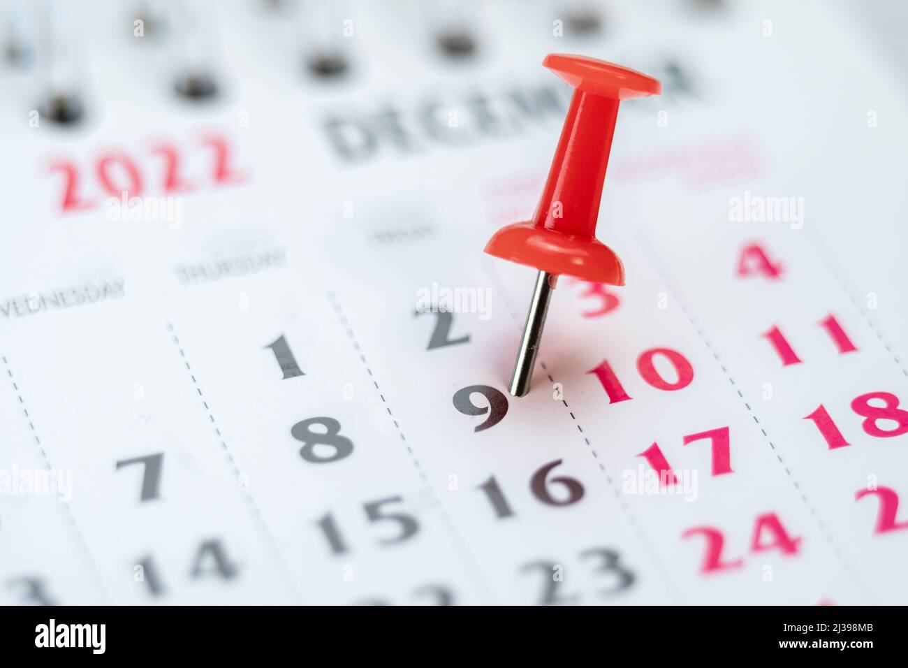 Red push pin on calendar 9th day of the month, mark the Event day with ...