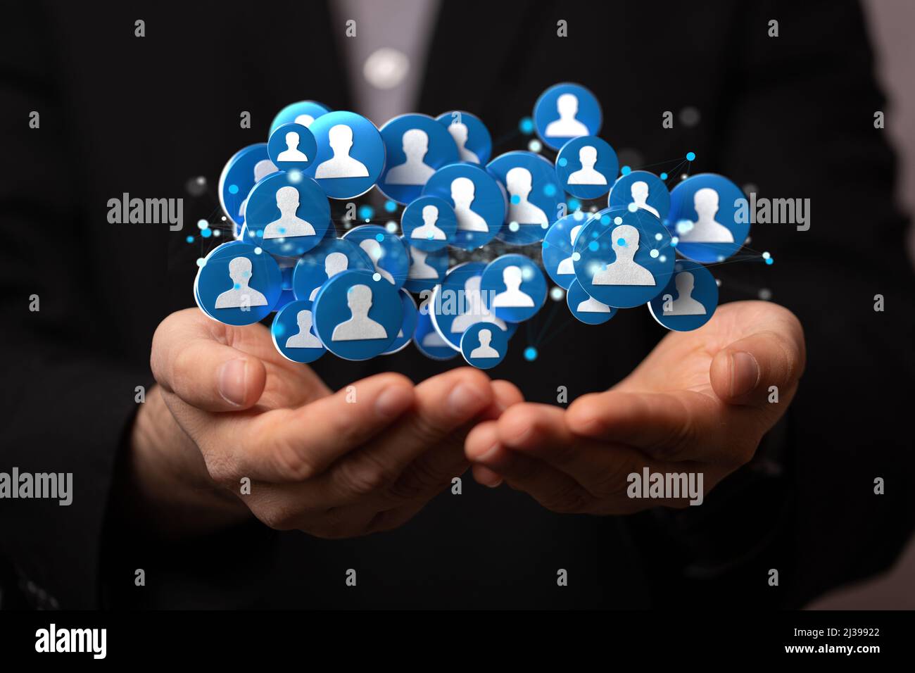 An illustration of people icons above the hands Stock Photo - Alamy