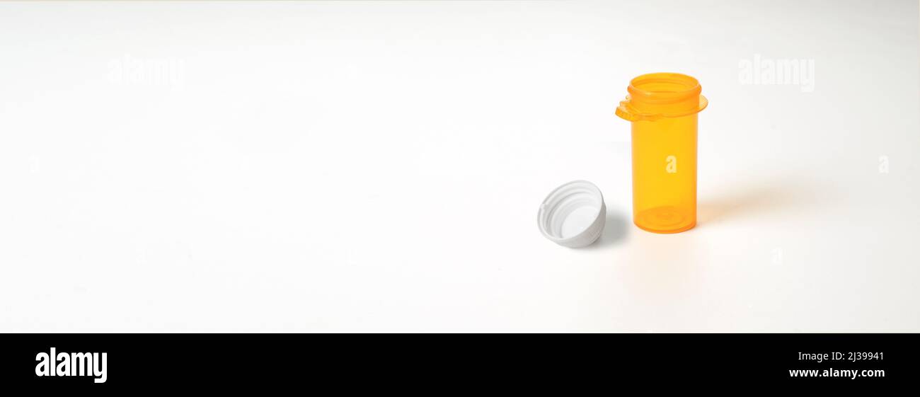 empty and open prescription bottle on white background Stock Photo - Alamy