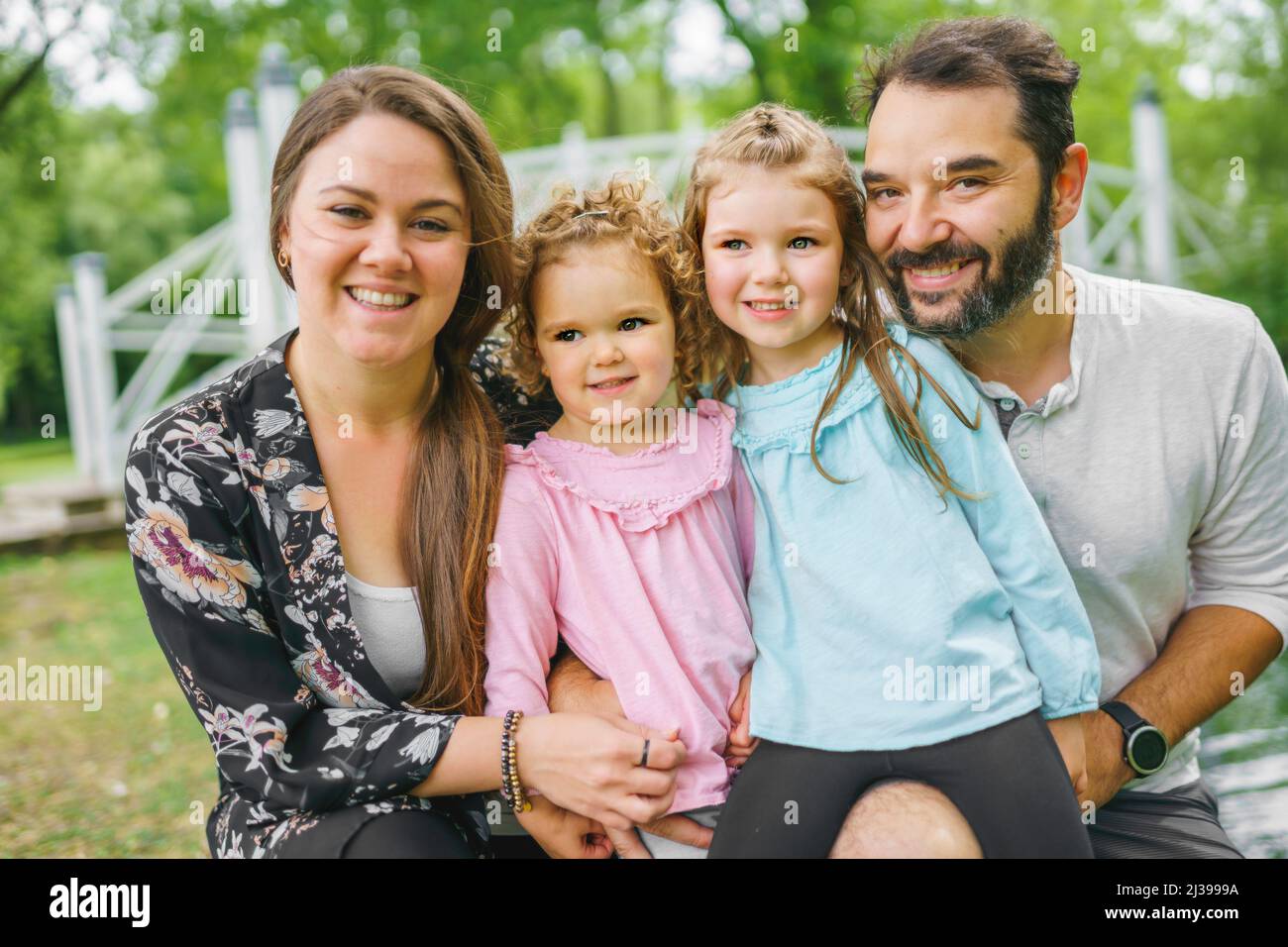 nice family having fun in summer forest Stock Photo - Alamy
