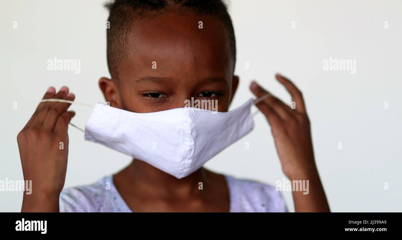 African american boy wearing face hi-res stock photography and images ...