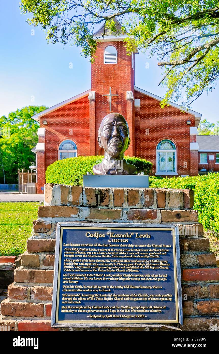 A bust of Cudjoe Kazoola Lewis, the last known survivor of the slave ...