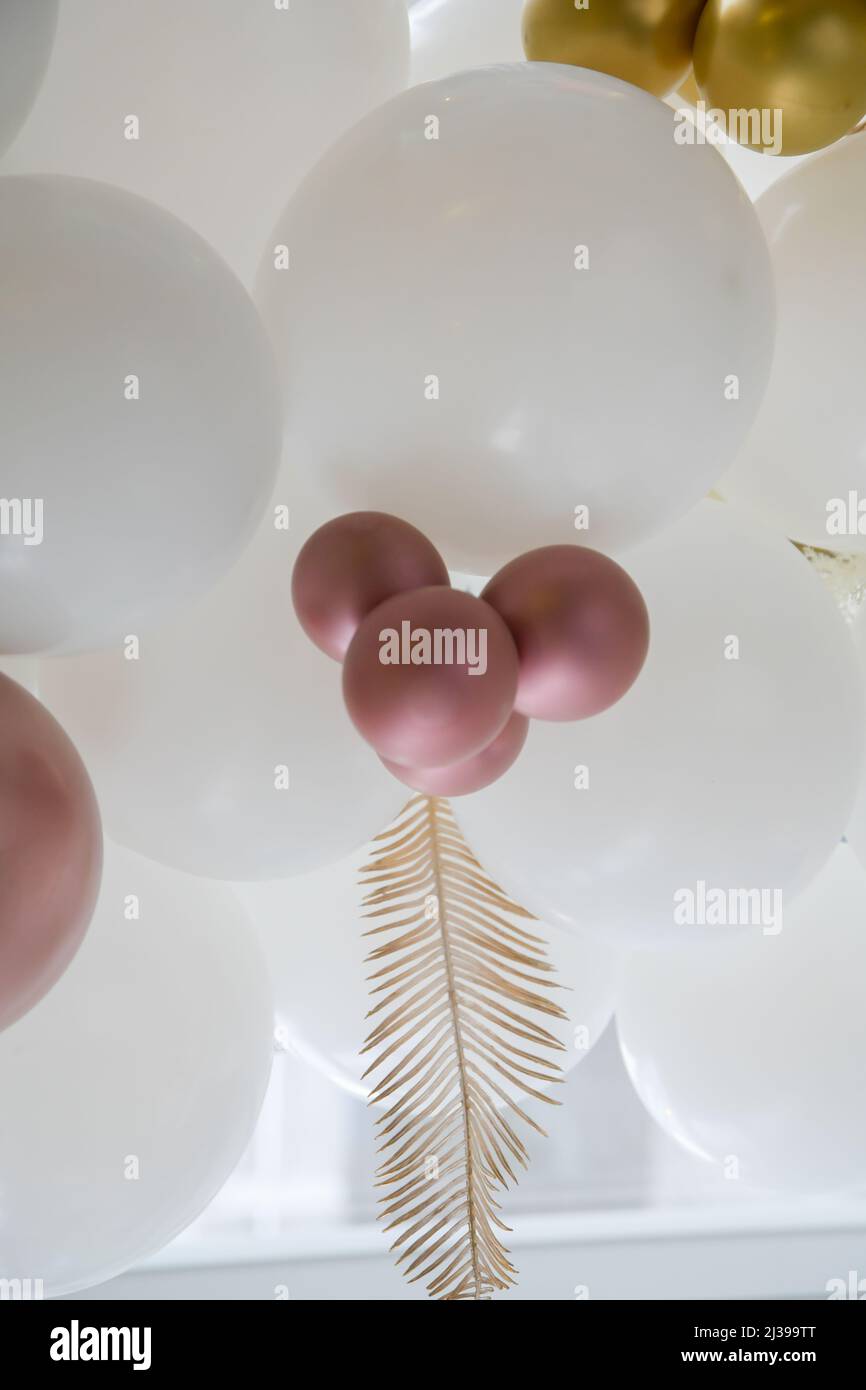 Many colorful balloons decorated wall as background. Beautiful ...