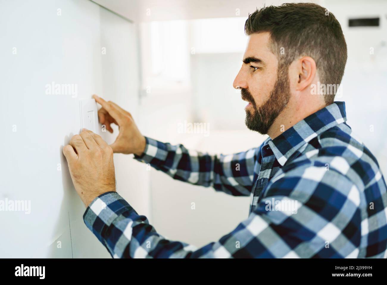 Portrait of an electrician happy worker at work Stock Photo - Alamy