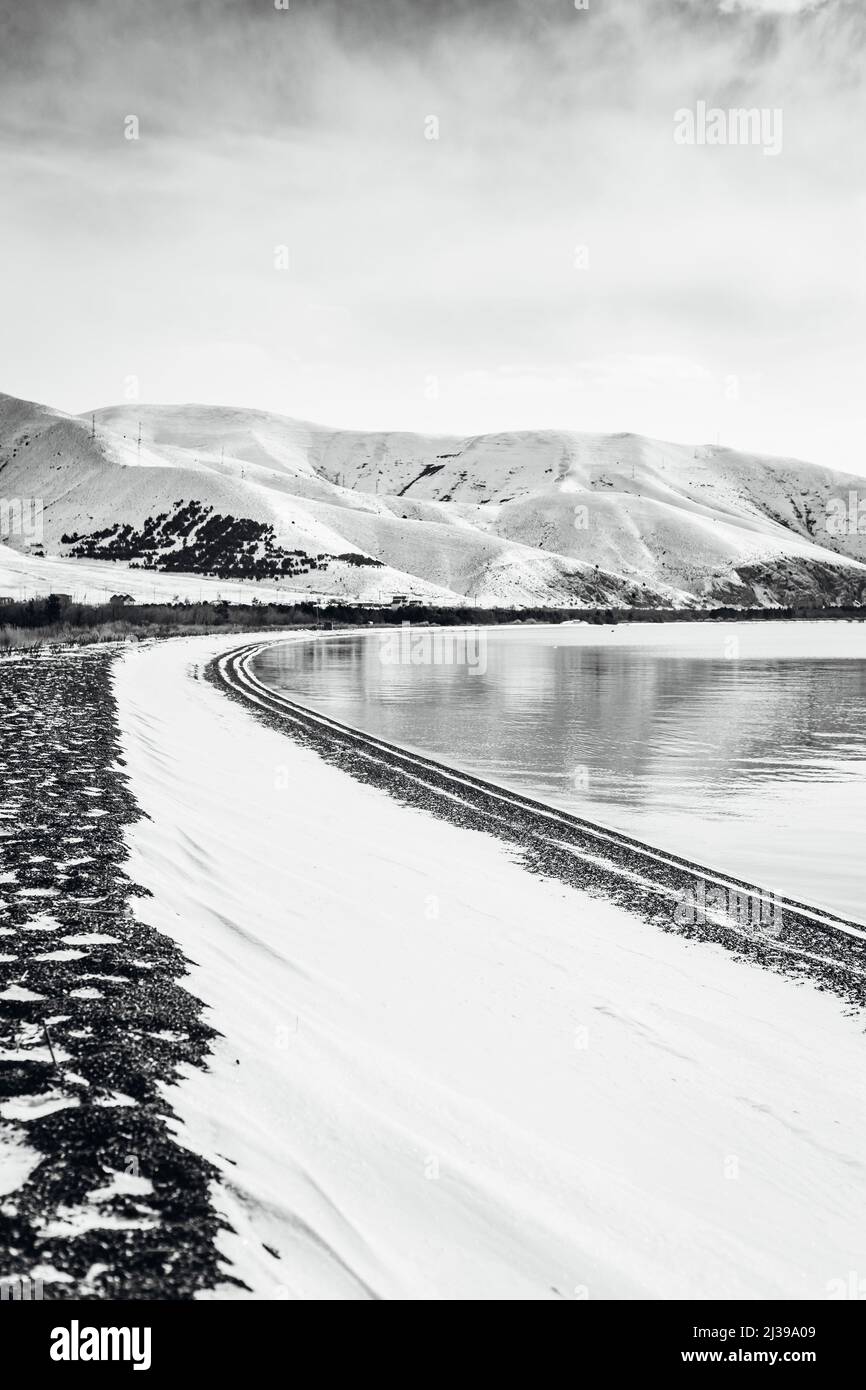 The frozen view of Lake Sevan in black and white Stock Photo - Alamy