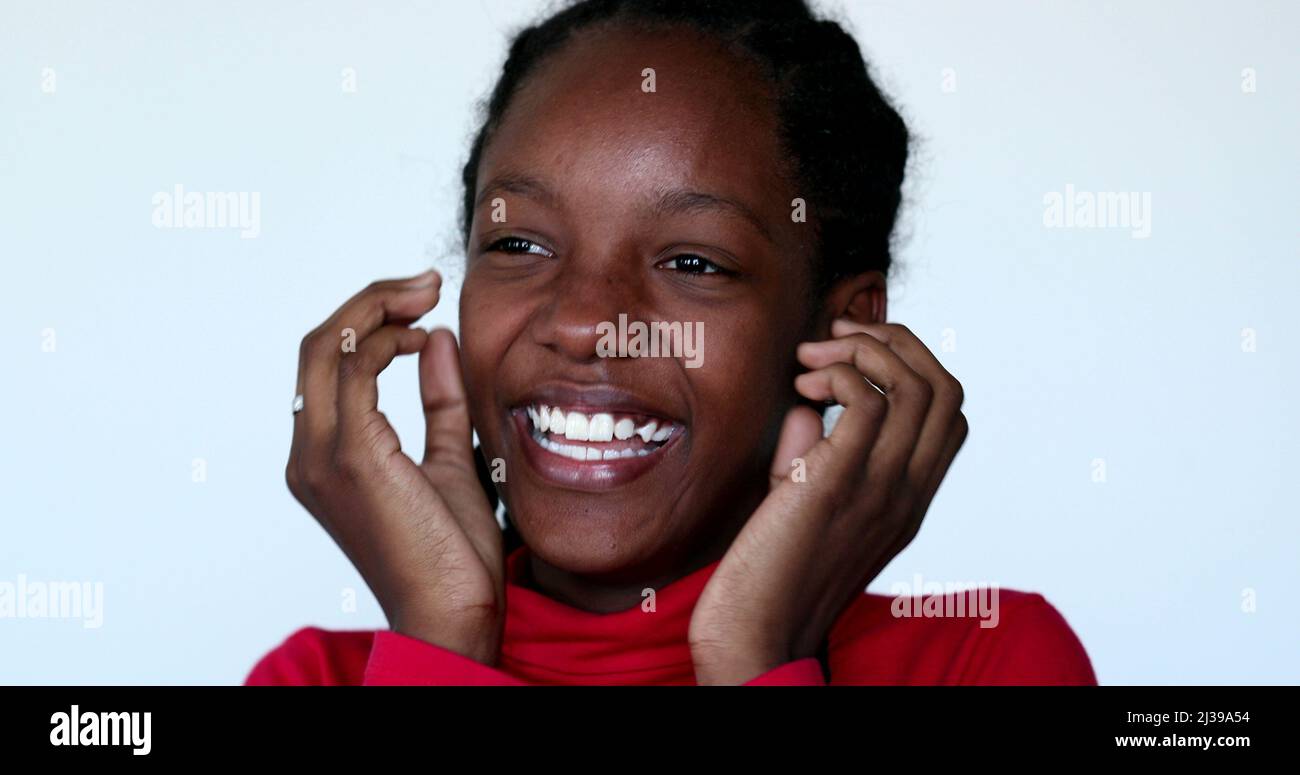 Black girl laughing uncontrollably. African teenager real life laugh ...