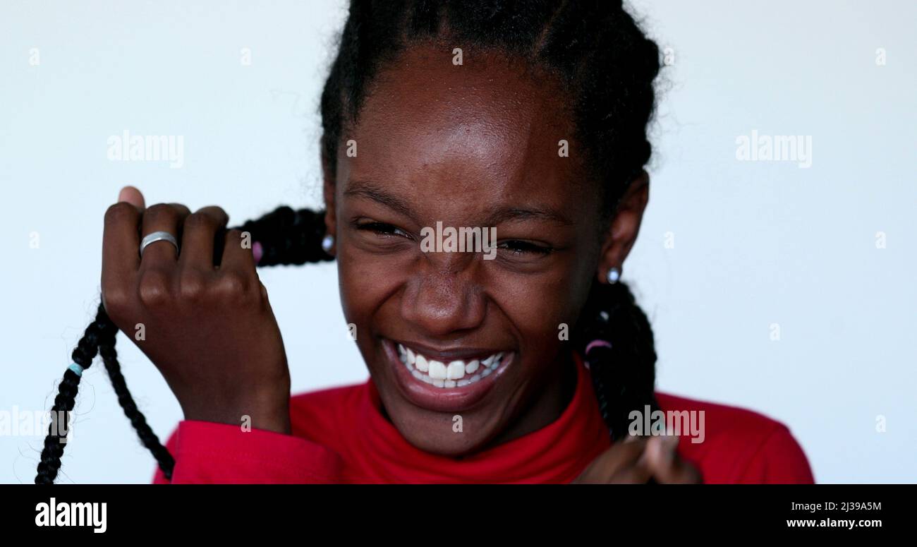 Black girl laughing uncontrollably. African teenager real life laugh ...