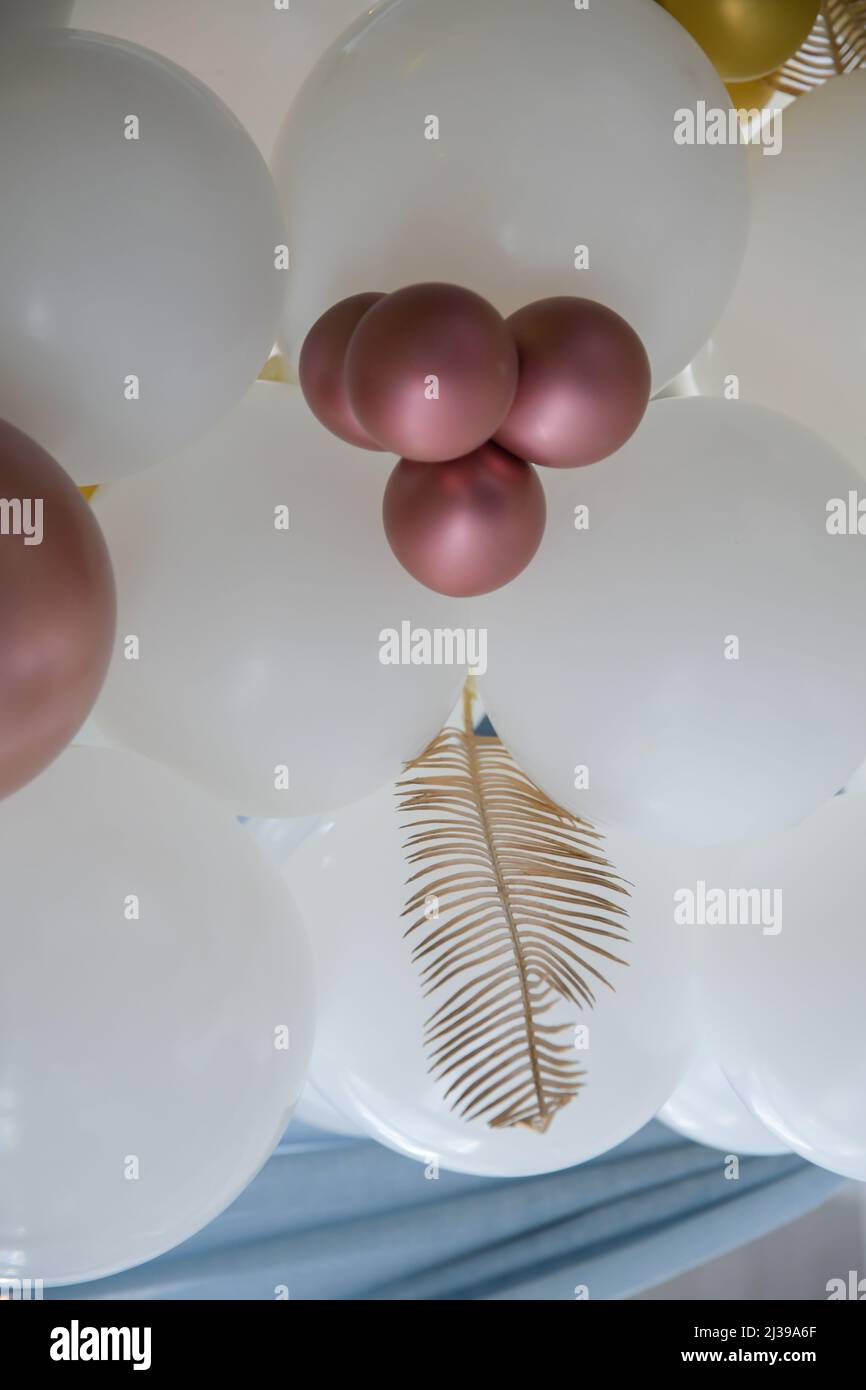 Many colorful balloons decorated wall as background. Beautiful ...