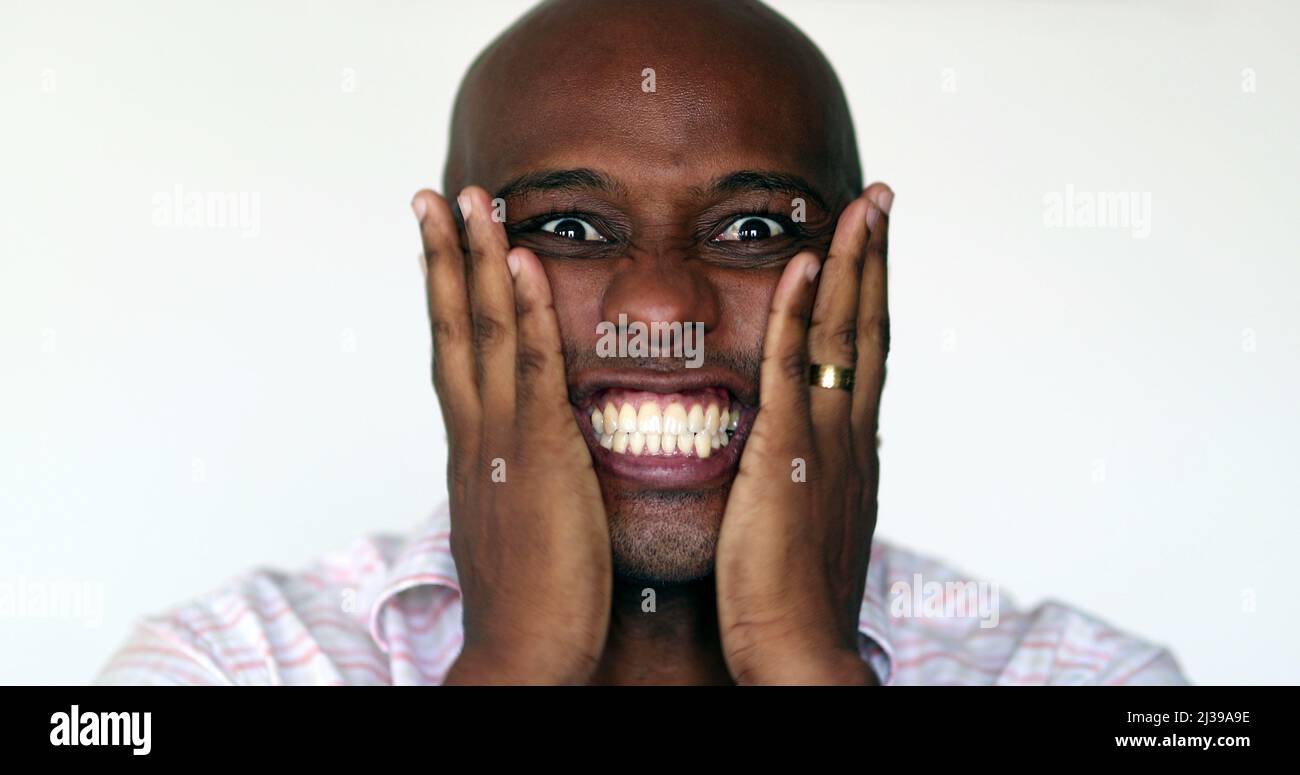 Desperate African man close-up emotional stress reaction Stock Photo ...