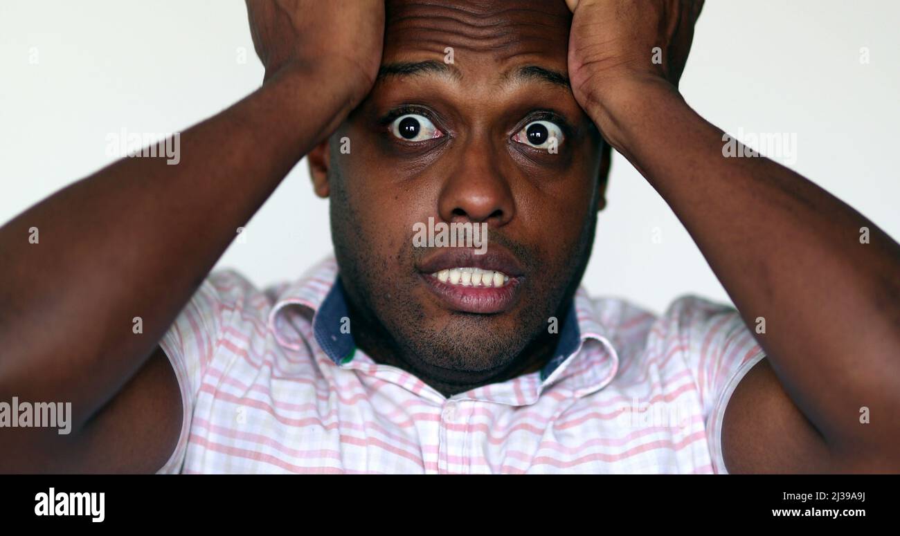 Desperate African man close-up emotional stress reaction Stock Photo ...
