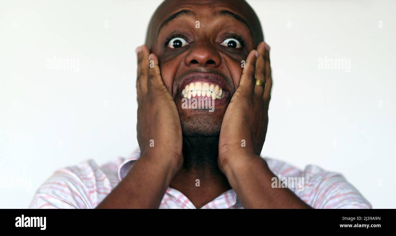 Desperate African man close-up emotional stress reaction Stock Photo ...