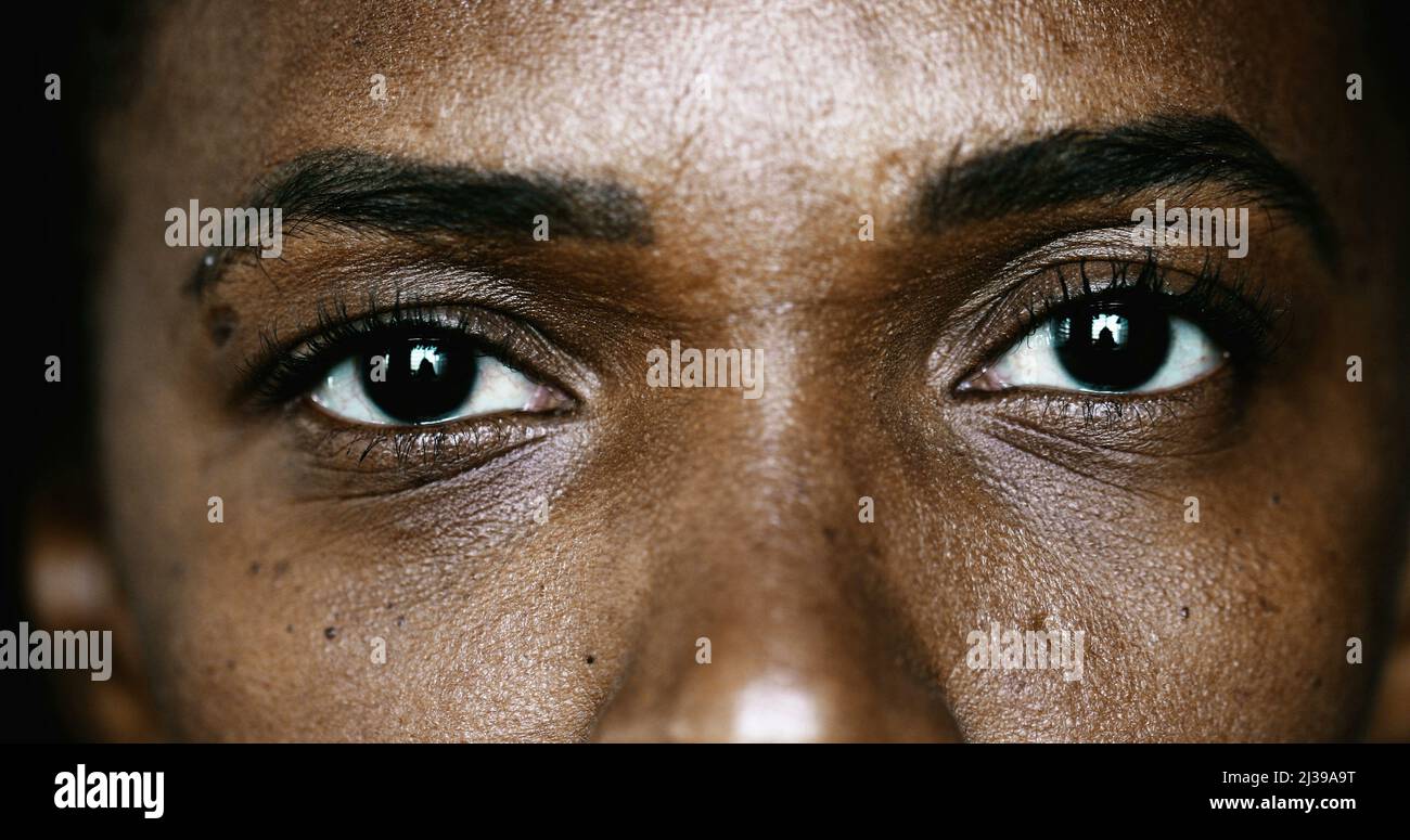 Close-up African woman eyes macro staring at camera Stock Photo - Alamy