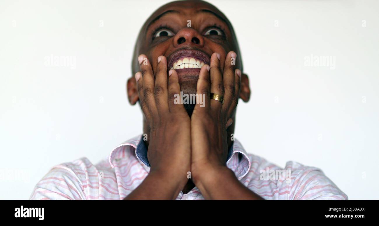 Desperate African man close-up emotional stress reaction Stock Photo ...