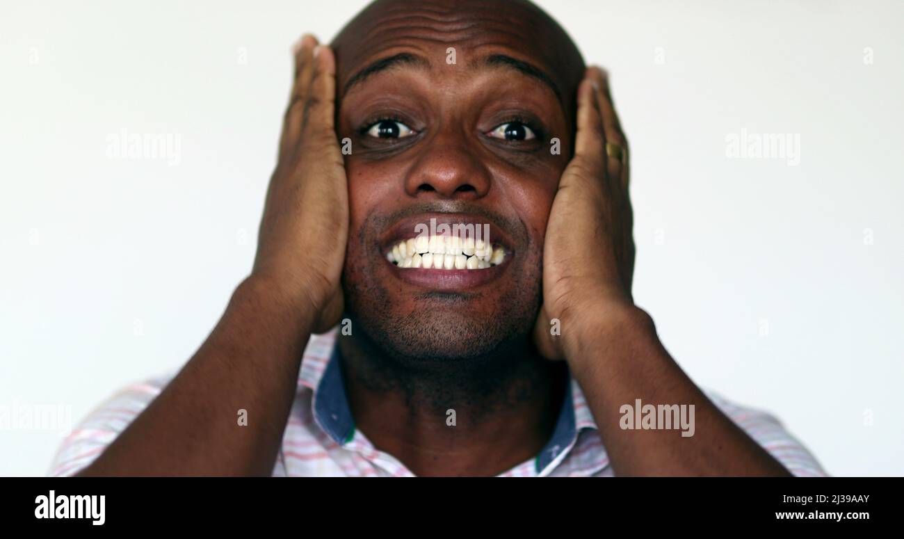 Desperate African man close-up emotional stress reaction Stock Photo ...