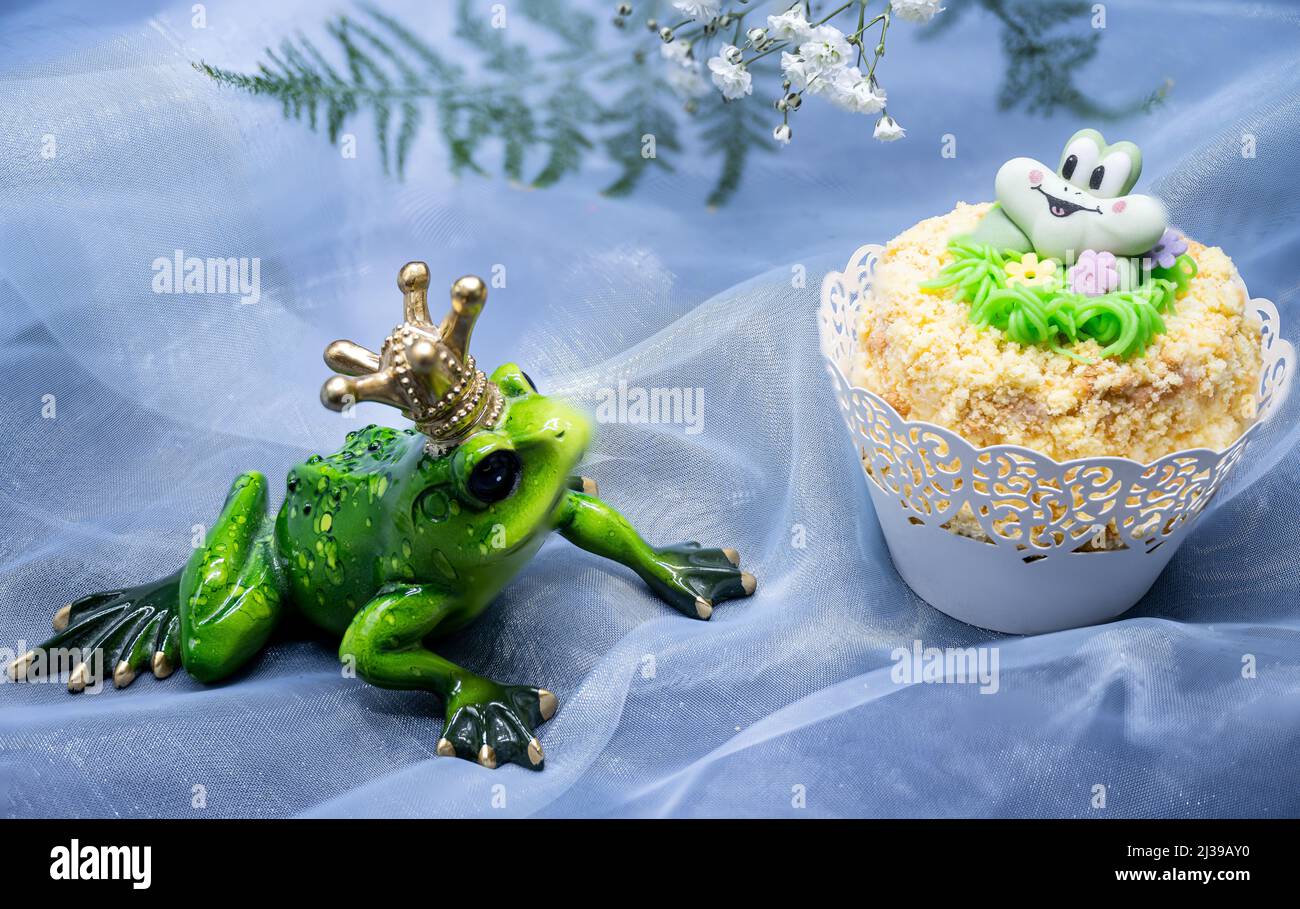 Decoration from fresh flowers and muffin. Template for greeting cards ...