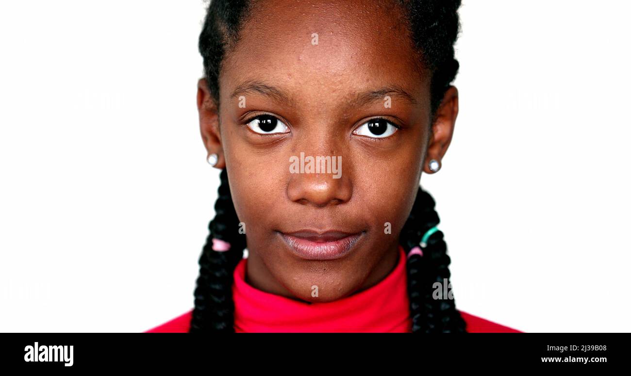 Portrait African teen child girl close-up face looking at camera Stock ...