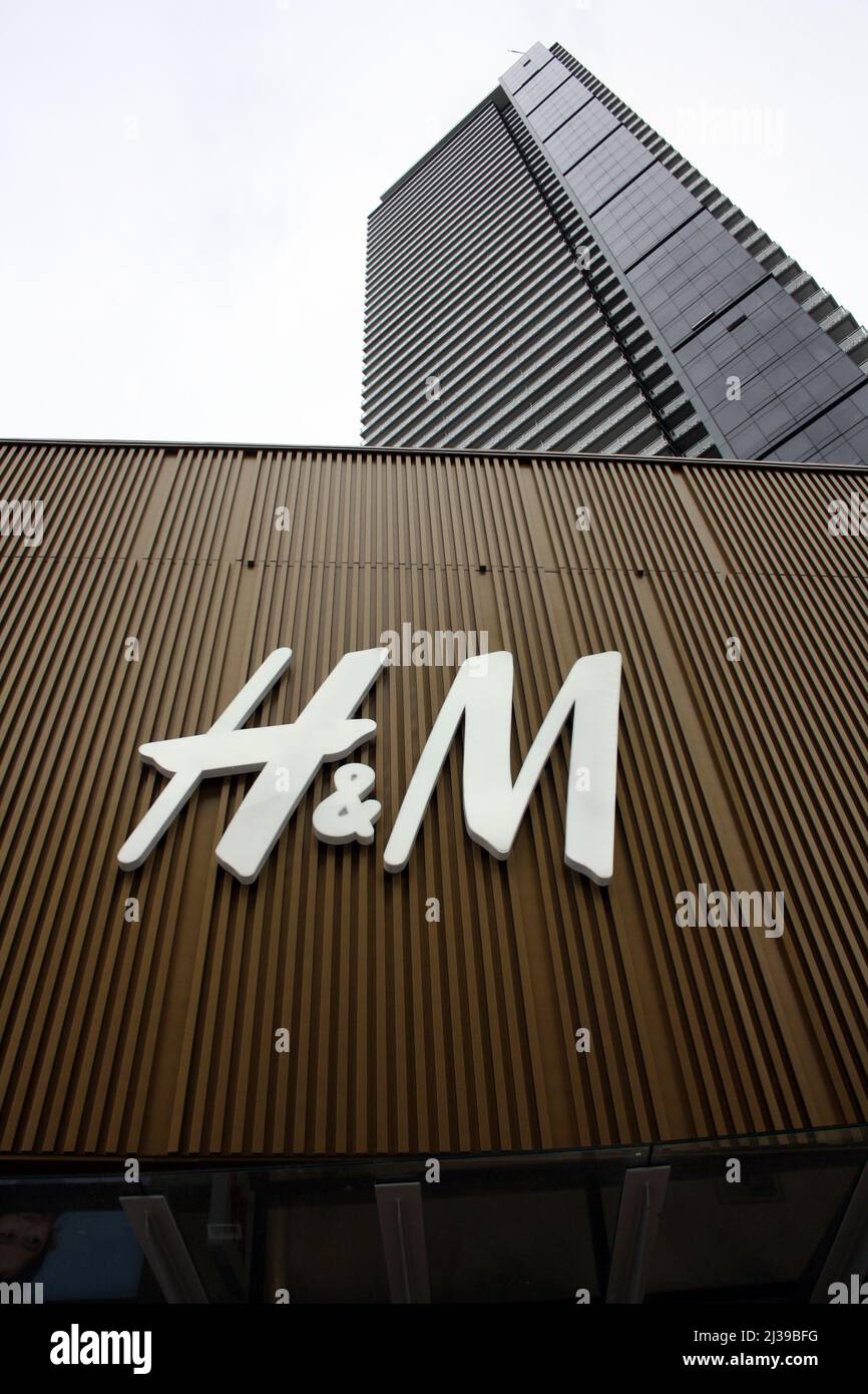 The H and M signage and high rise residential building at Brentwood ...