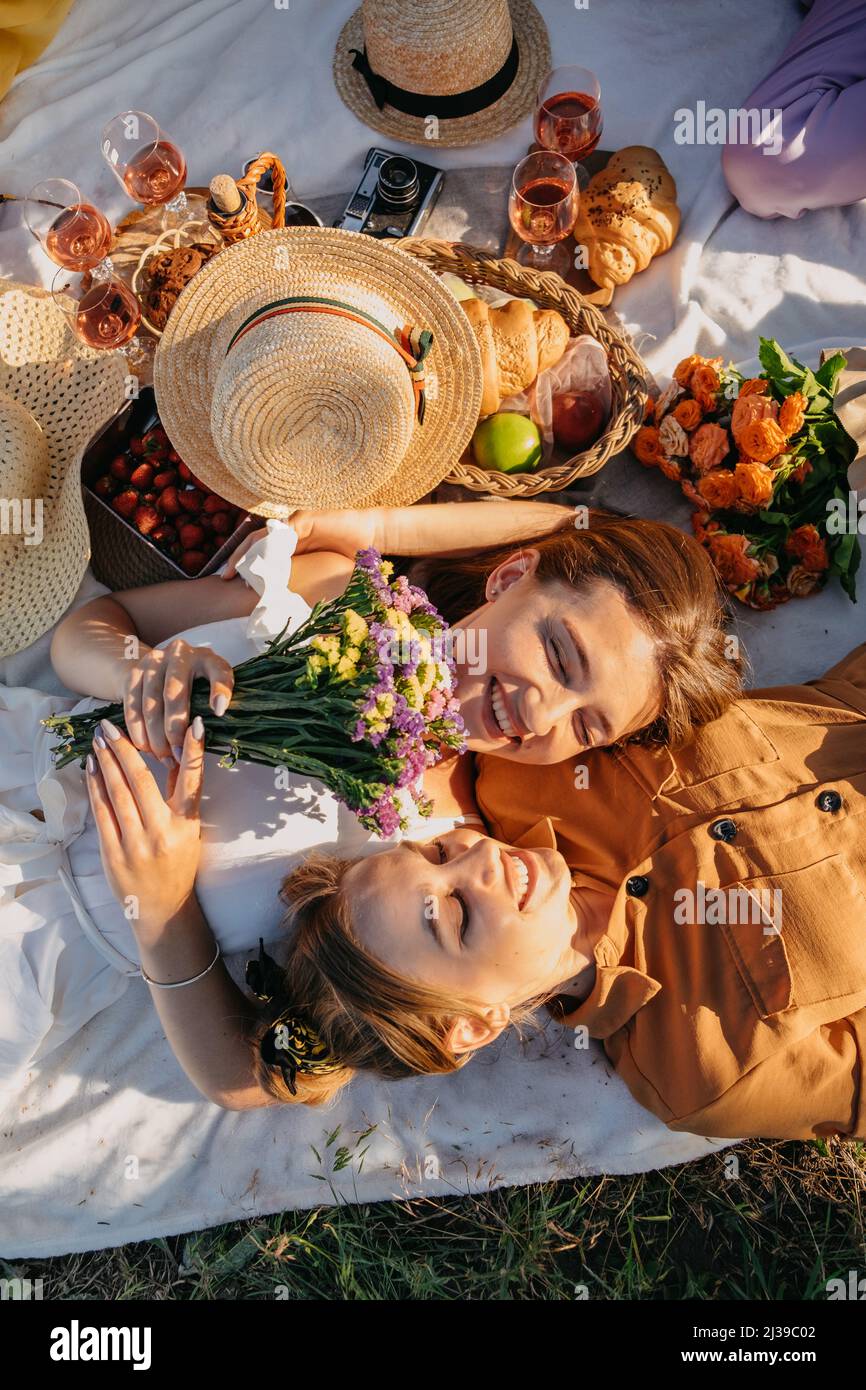 Summer party, Outdoor Gathering with friends. Two young women, Friends ...