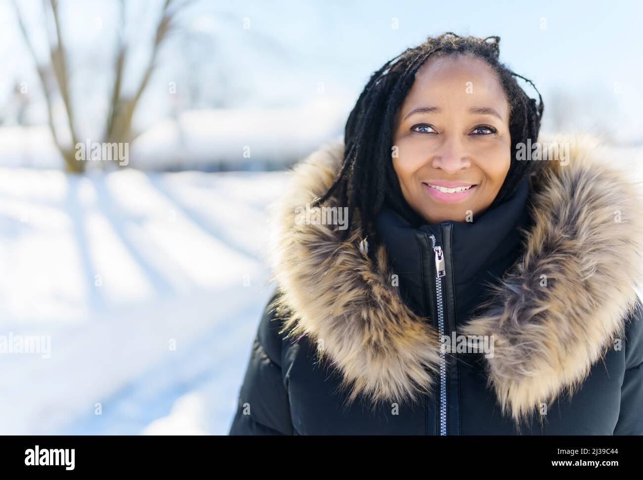 black woman on winter season with coat Stock Photo - Alamy