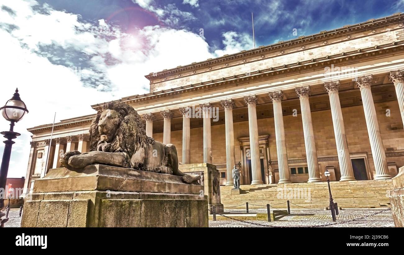A scenic view of a statue of a lion in front of an old medieval museum ...