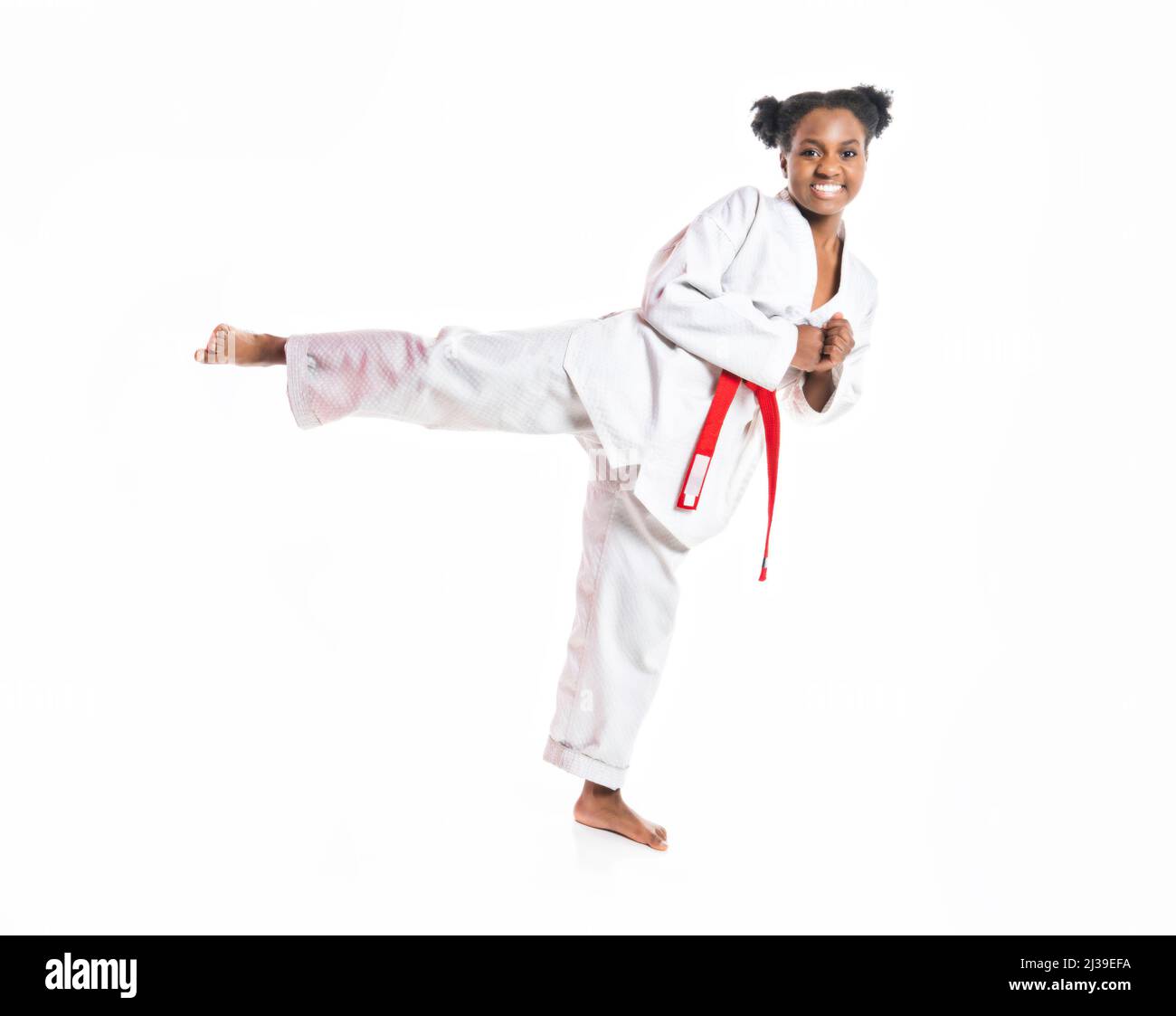 Young black belt karate fighter training Isolated portrait on white ...