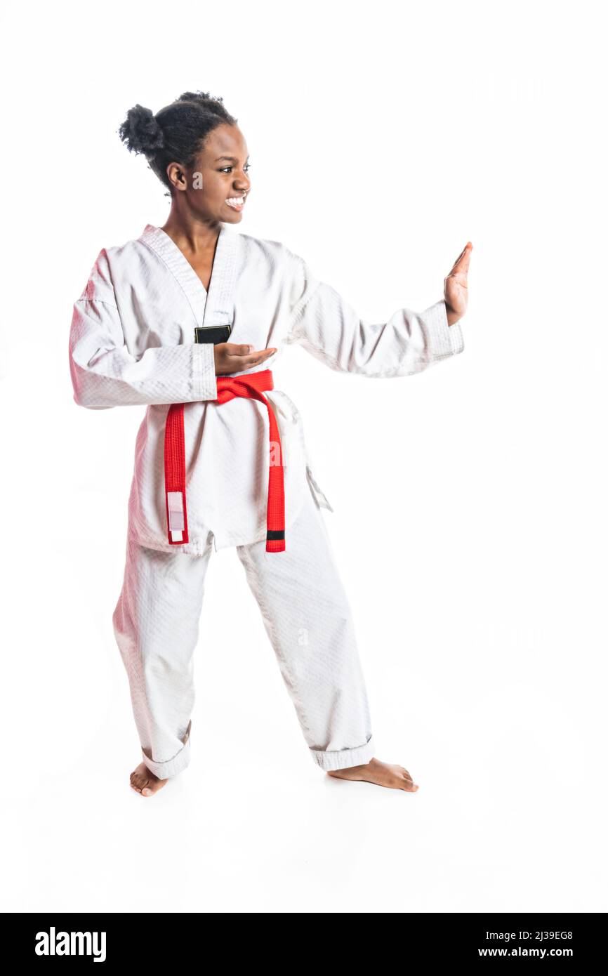Young black belt karate fighter training Isolated portrait on white ...