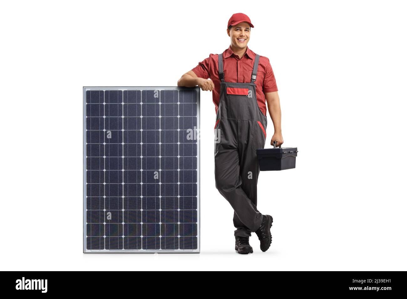 Full length portrait of a technician with a tool box leaning on a solar ...