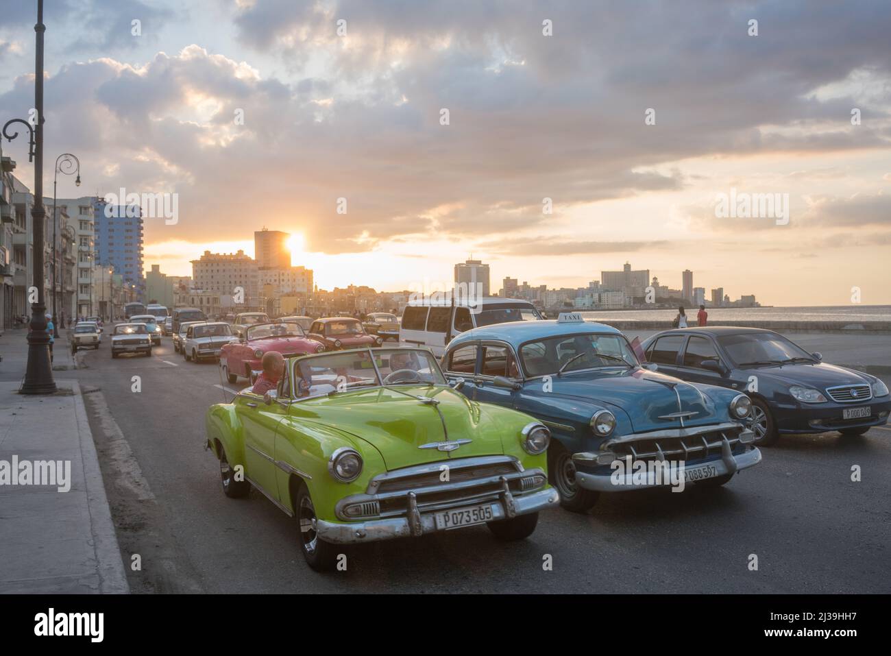 Traffic jam of old American classic cars at sunset on the Malecon Old ...