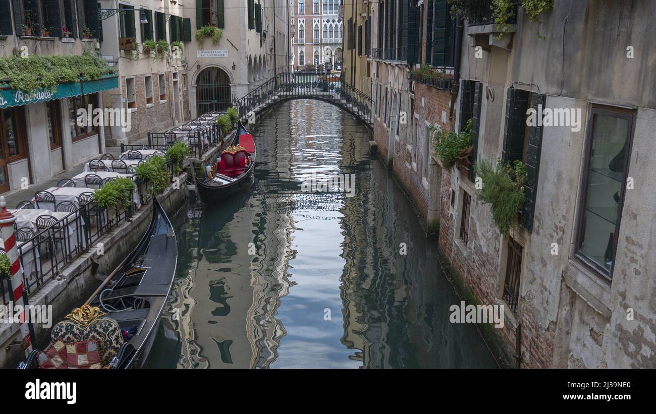 A scenic view of Venice with narrow channels and picturesque buildings ...
