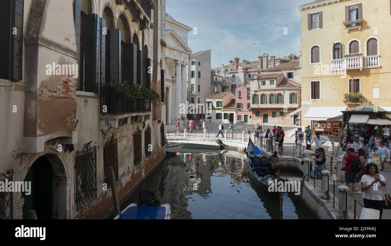 A scenic view of Venice with narrow channels and picturesque buildings ...