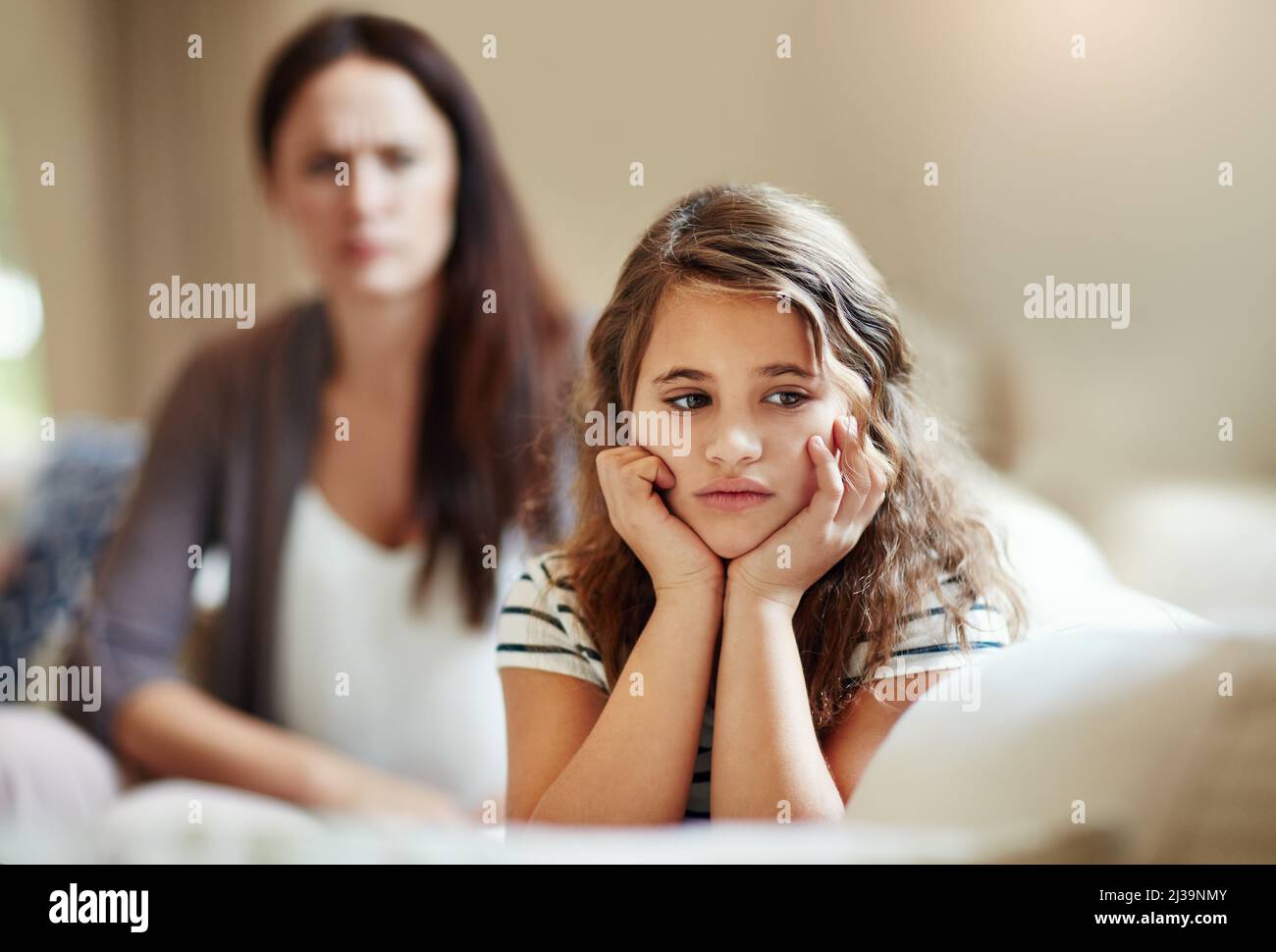 Do not ignore me when I am talking. Cropped shot of a young girl being ...