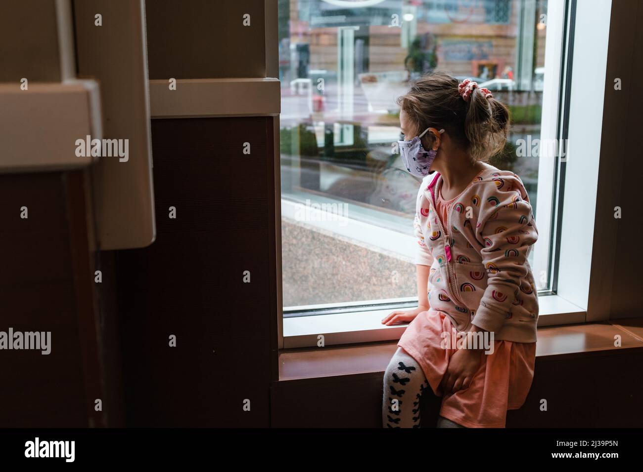 Children playing out the window hi-res stock photography and images - Alamy