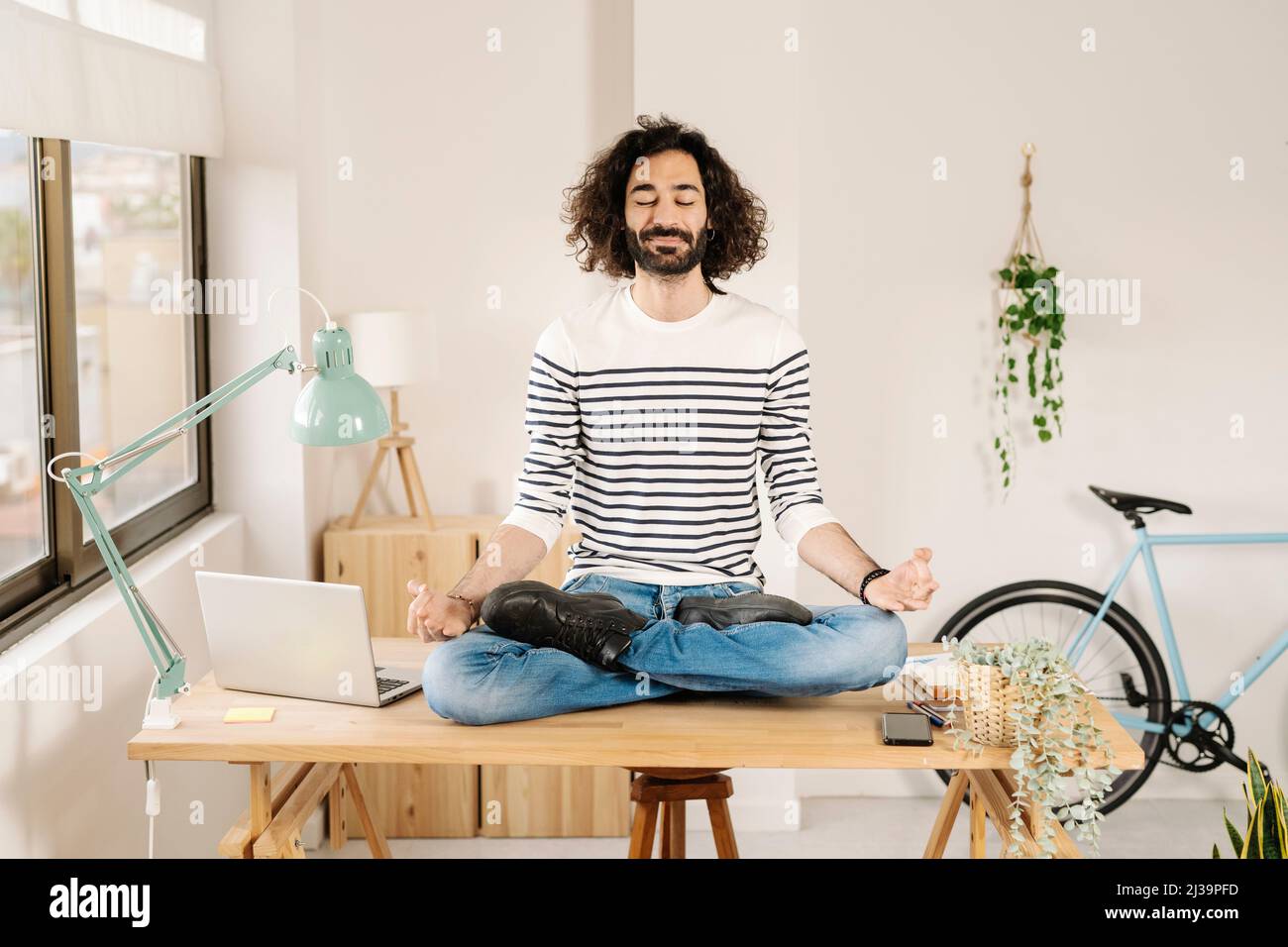 Professional meditating at work hi-res stock photography and images - Alamy