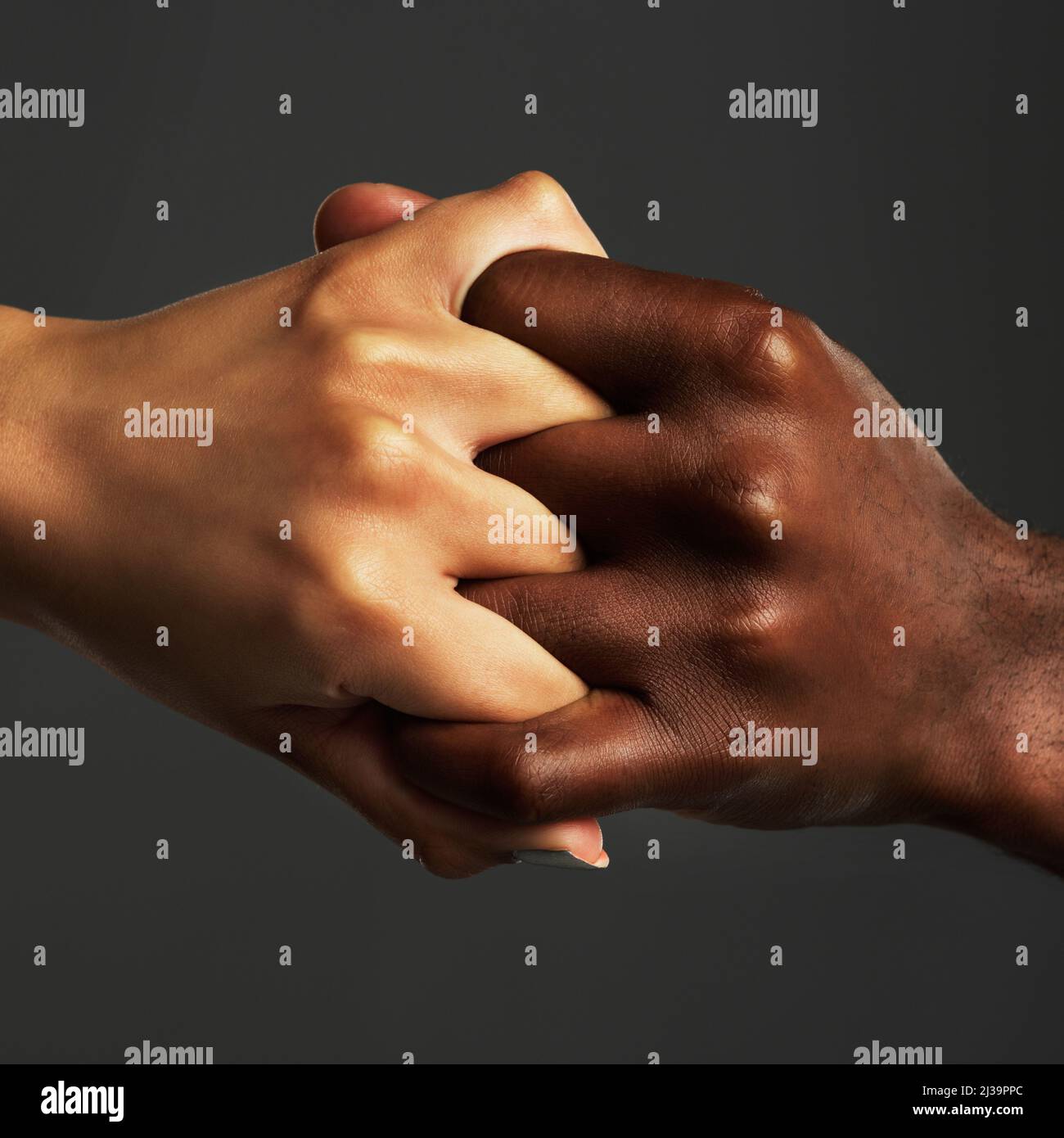 Were bound together forever. Studio shot of two unrecognizable people ...